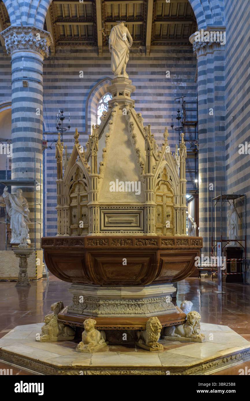 Marble baptismal font with lions and relief friezes, Duomo di Orvieto ...