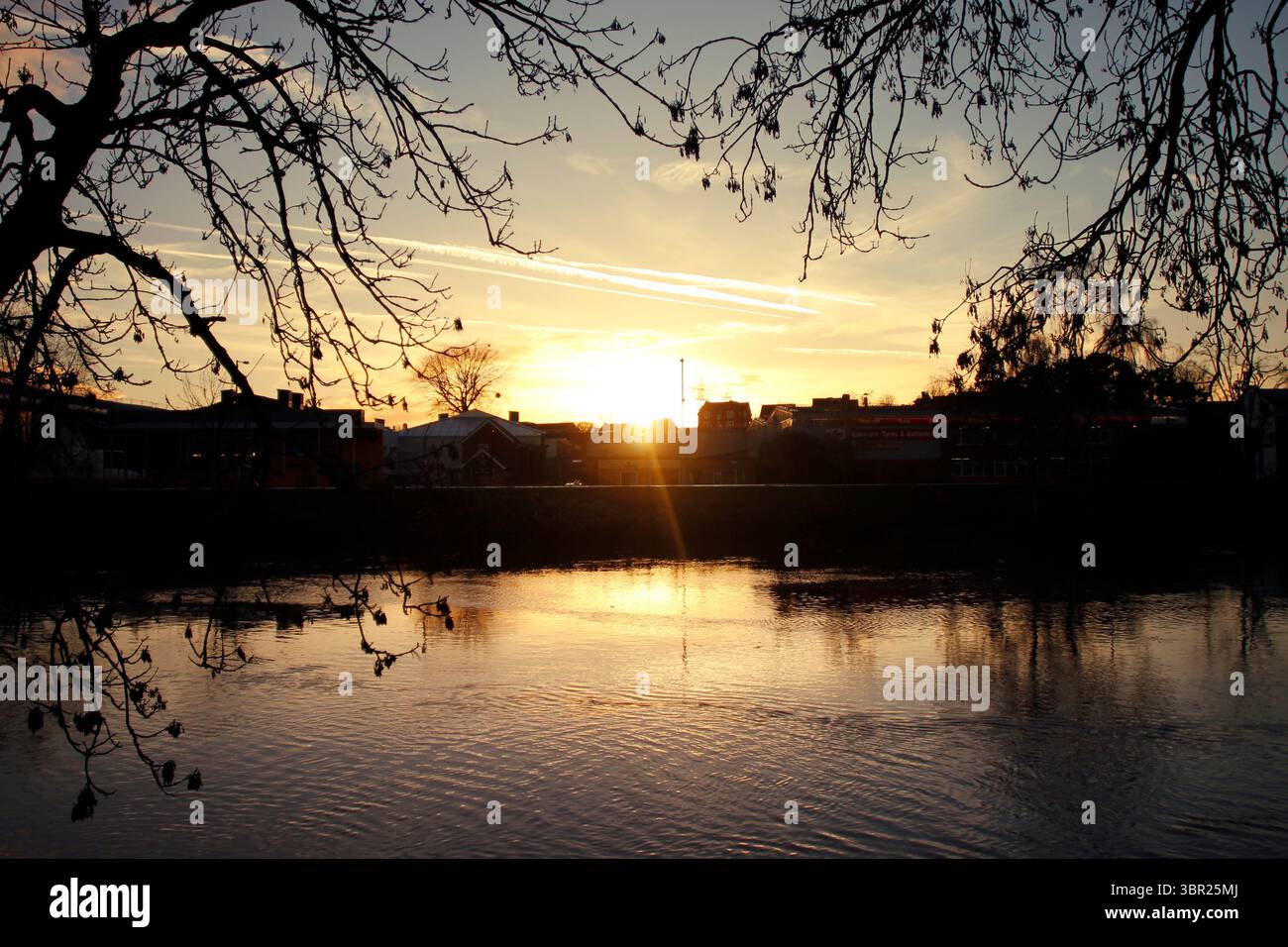 Sun setting in Worcester, England, UK Stock Photo - Alamy
