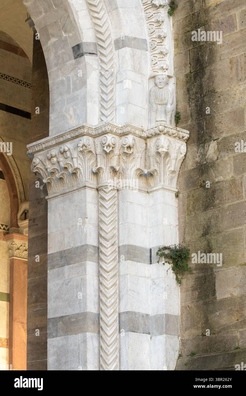 Romanesque corner column with acanthus capitals and chevron decoration ...