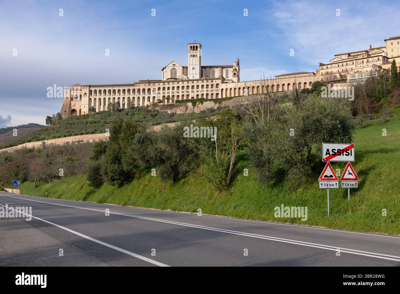 Roadside view of the Basilica of Saint Francis and Sacro Convento from ...