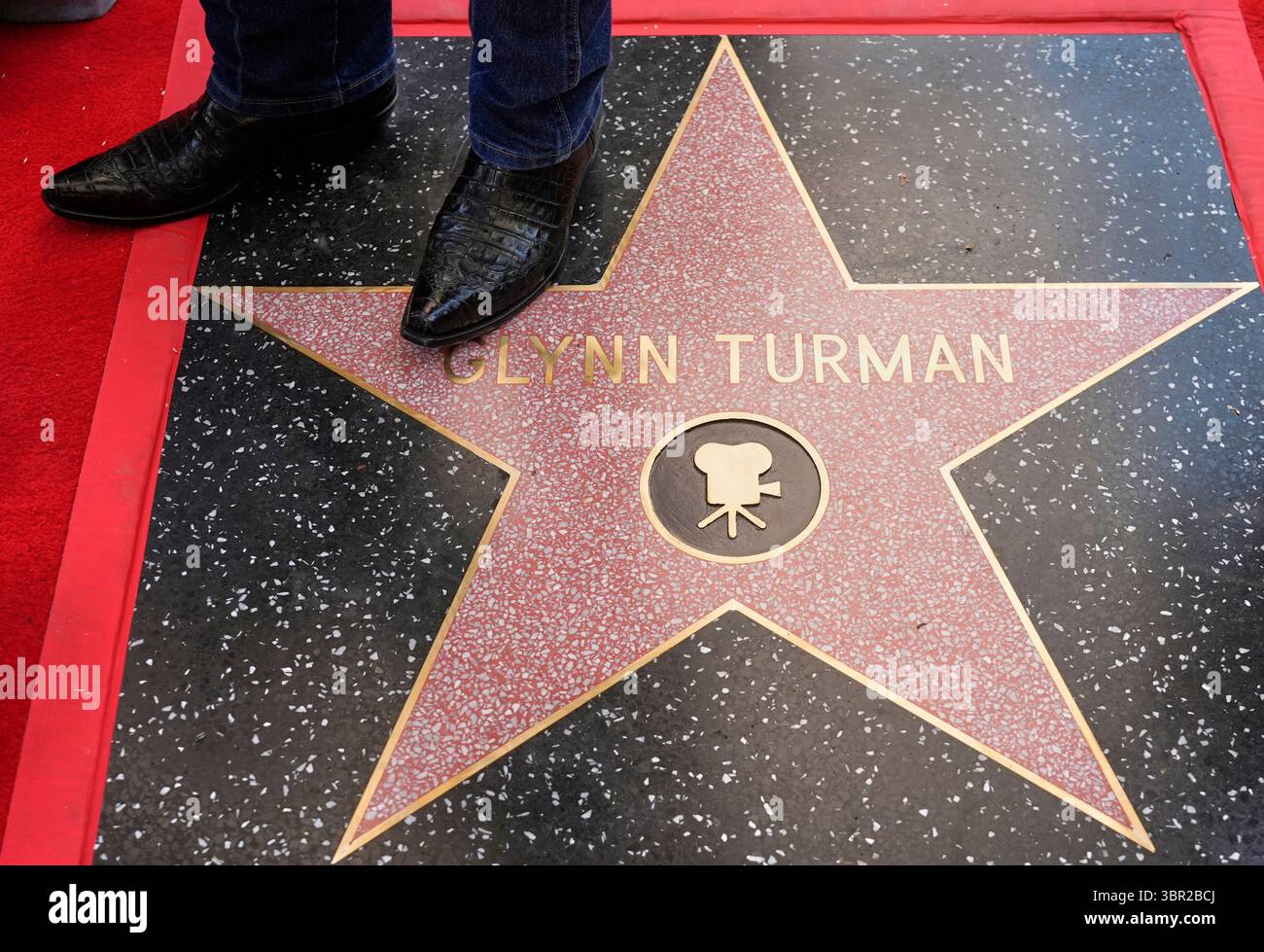 Actor Glynn Turman stands atop his new star on the Hollywood Walk of ...