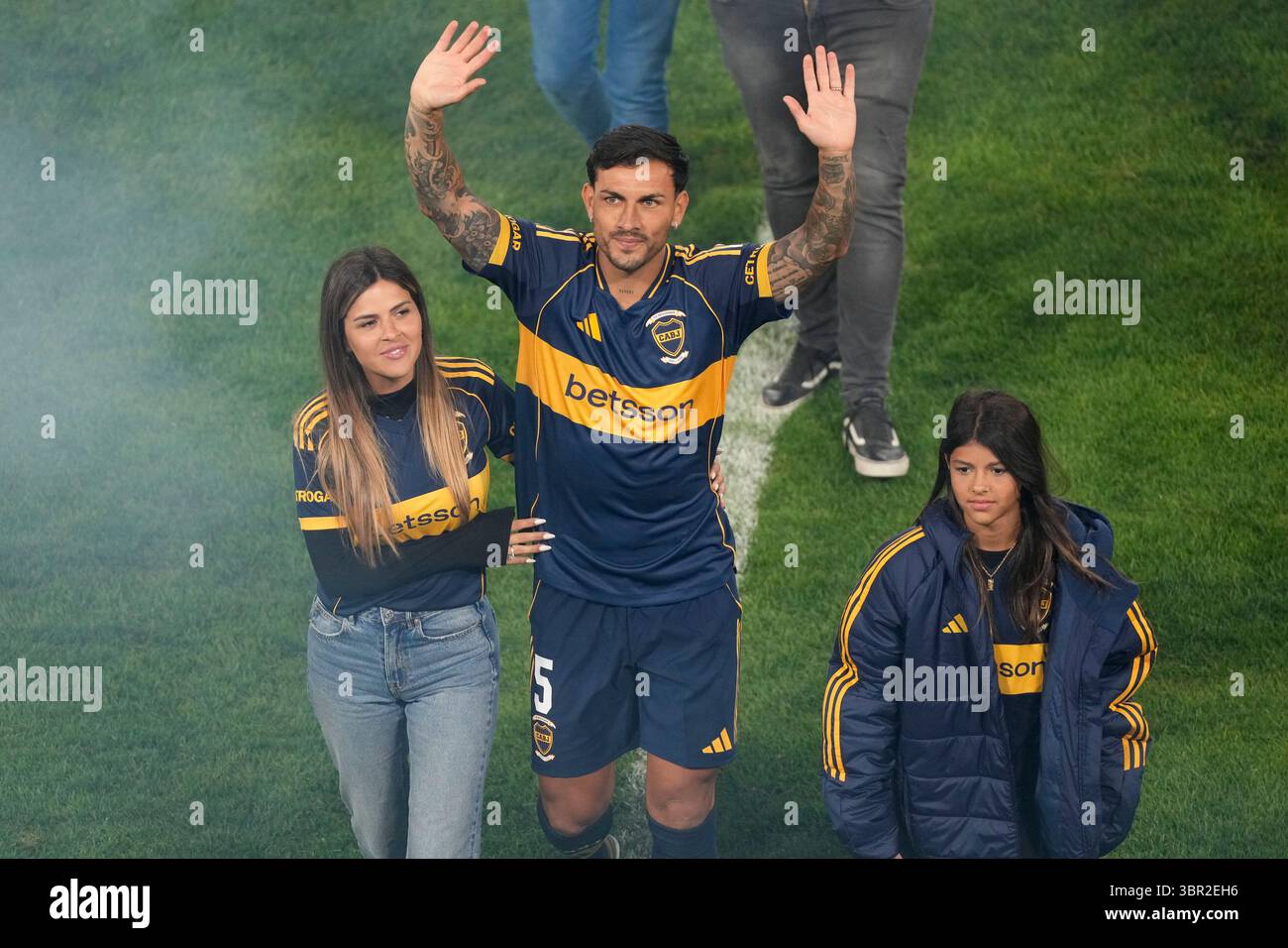 Leandro Paredes, center, with his wife Camila Galante and daughter ...