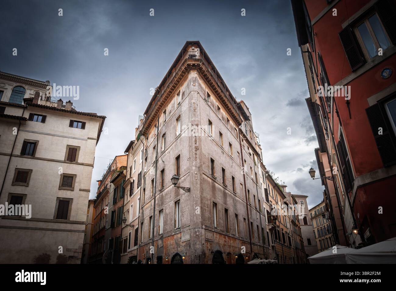Weathered Renaissance apartment building forms a sharp wedge between ...