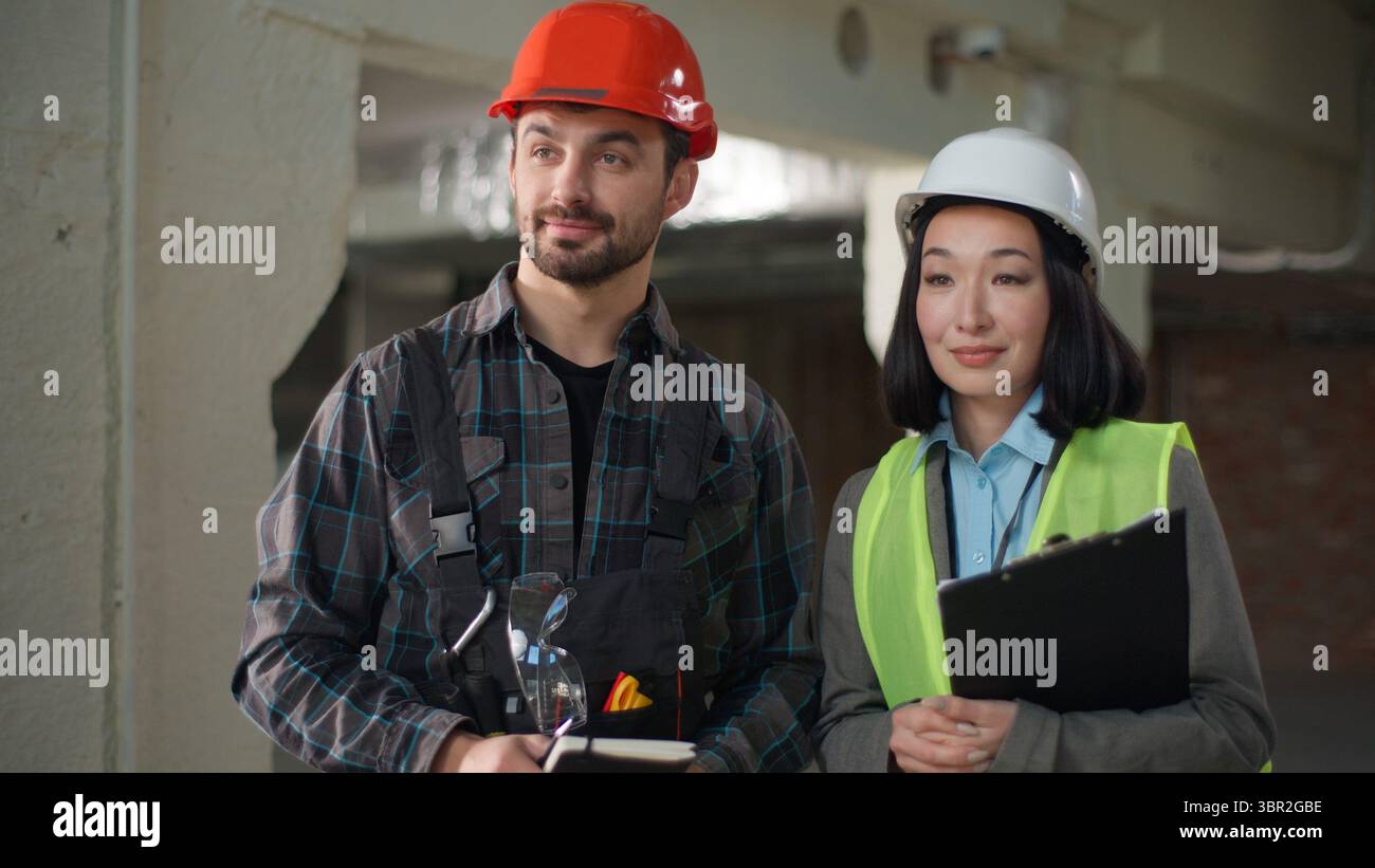 Happy multiethnic business builders inspection success construction ...