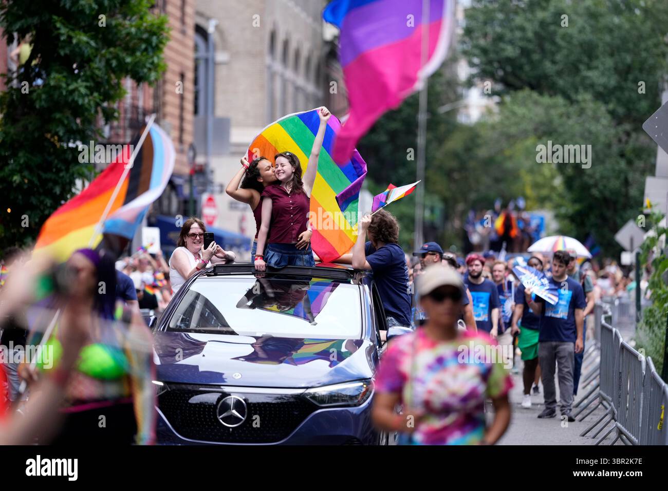 Parade-goers ride in the NYC Pride March on Sunday, June 29, 2025, in ...