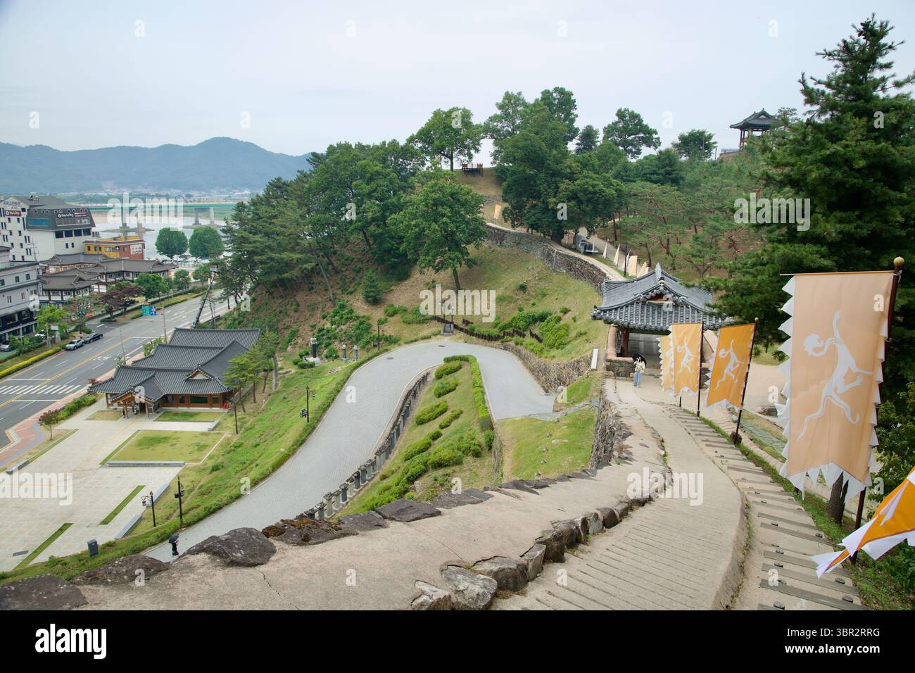 Gongju, South Korea - June 13th 2025: A sloped path lined with Baekje ...