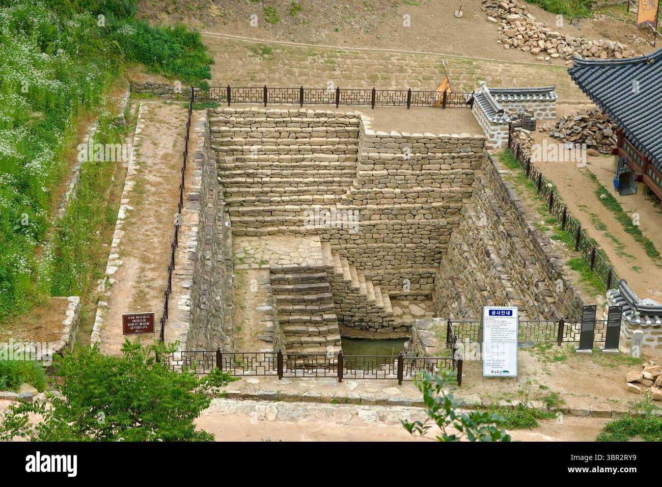 Gongju, South Korea - June 13th 2025: A restored square well sits ...