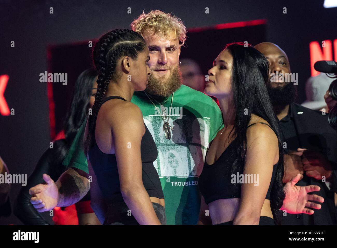Lila Furtado and Ramla Ali face off as Jake Paul stands with them ...