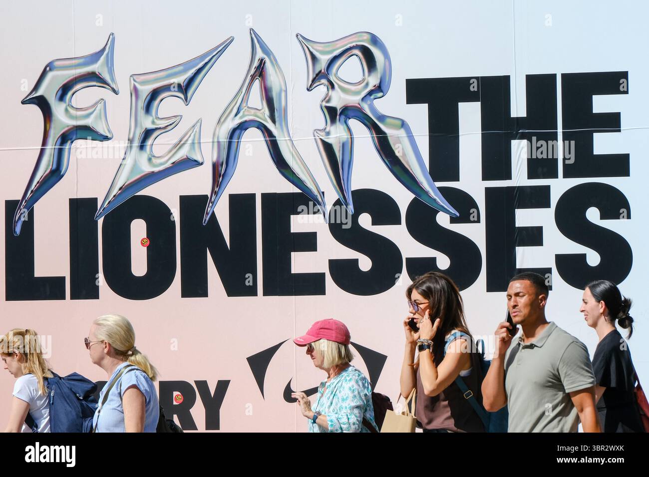 Advertising hoarding outside the Nike shop in Oxford Circus shows ...