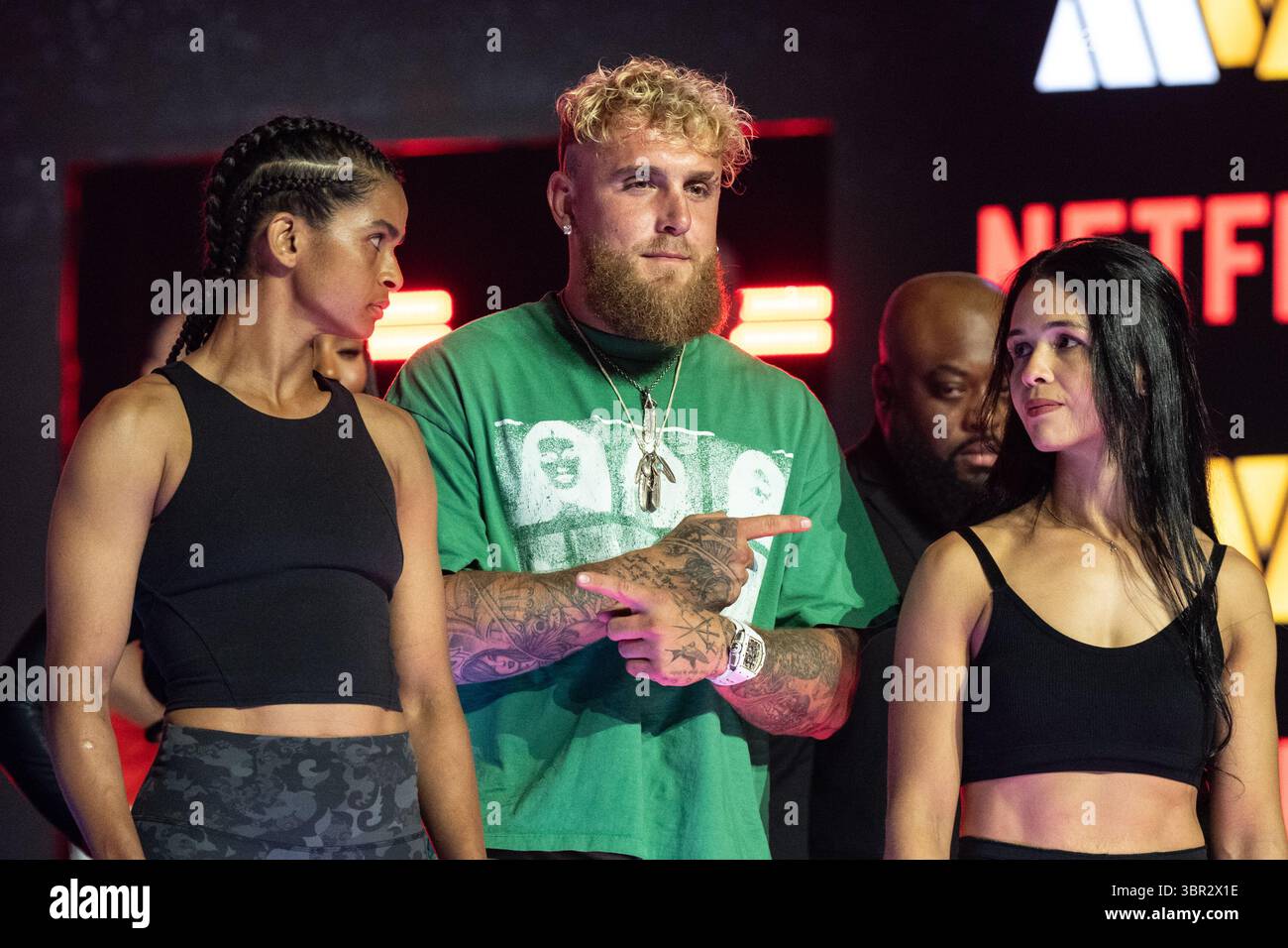 Lila Furtado and Ramla Ali face off as Jake Paul stands with them ...