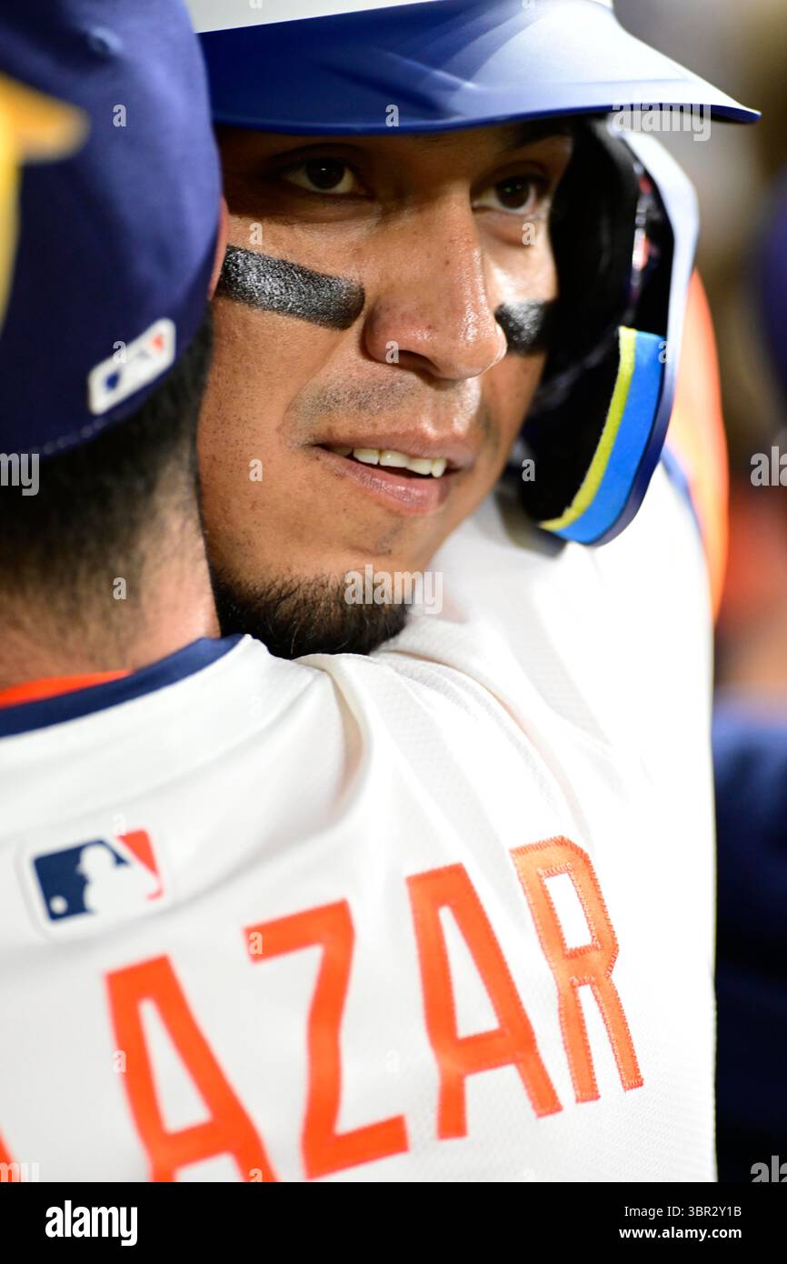 Houston Astros third baseman Isaac Paredes (15) gets a big hug from ...