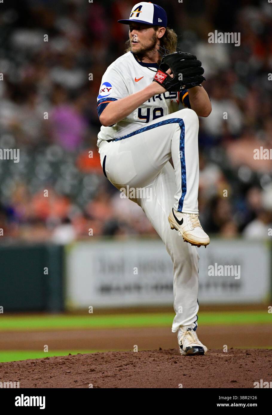 Houston Astros relief pitcher Steven Okert (48) in motion in the sixth ...