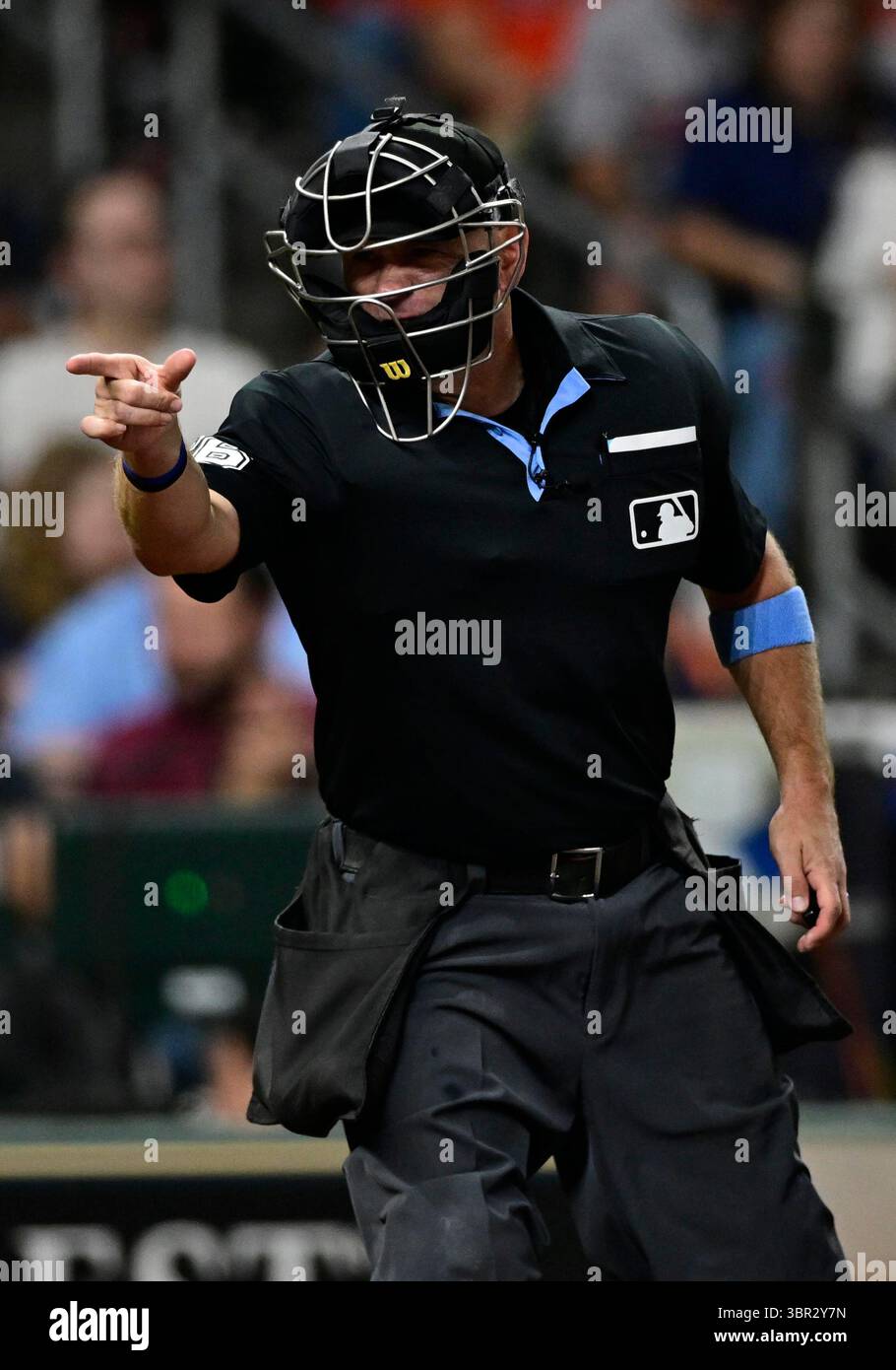 MLB umpire Mike Muchlinski (76) calls a strike in the seventh inning ...