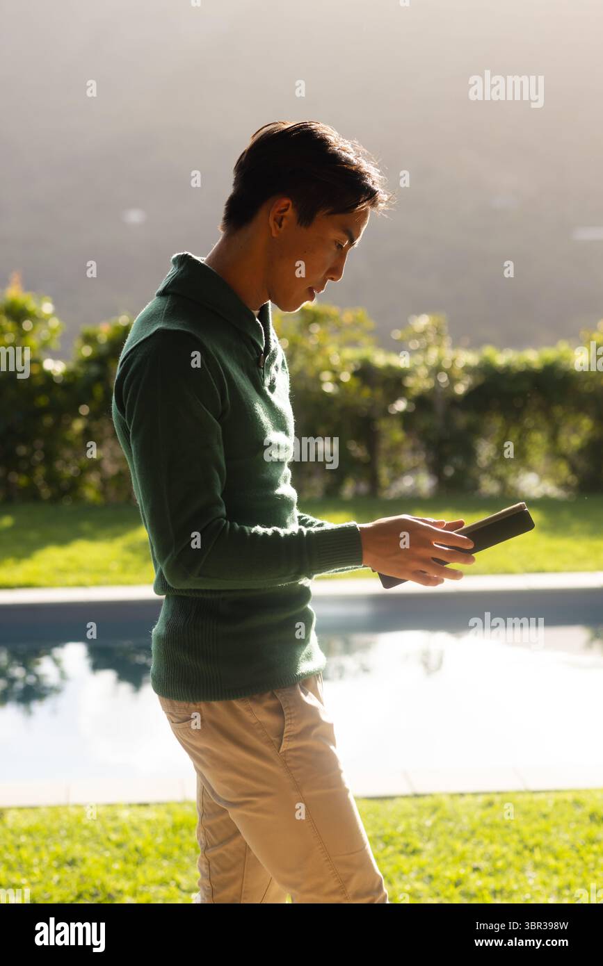 Person in green sweater hi-res stock photography and images - Alamy