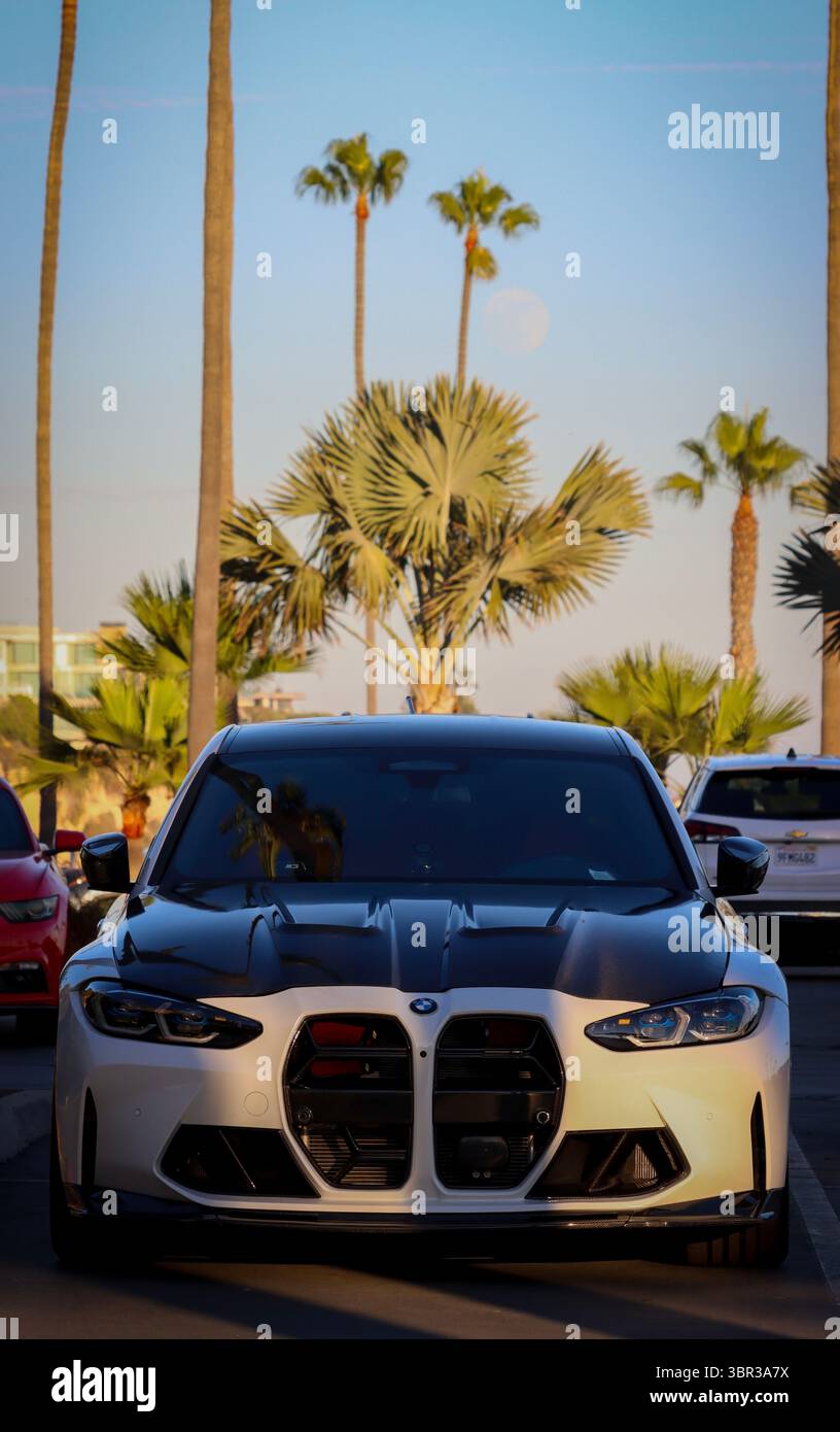 BMW M3 G80 with a carbon fiber hood at sunset Stock Photo - Alamy