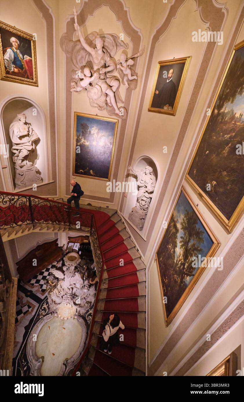The curved, round staircase, steps between museum floors. In a Baroque ...
