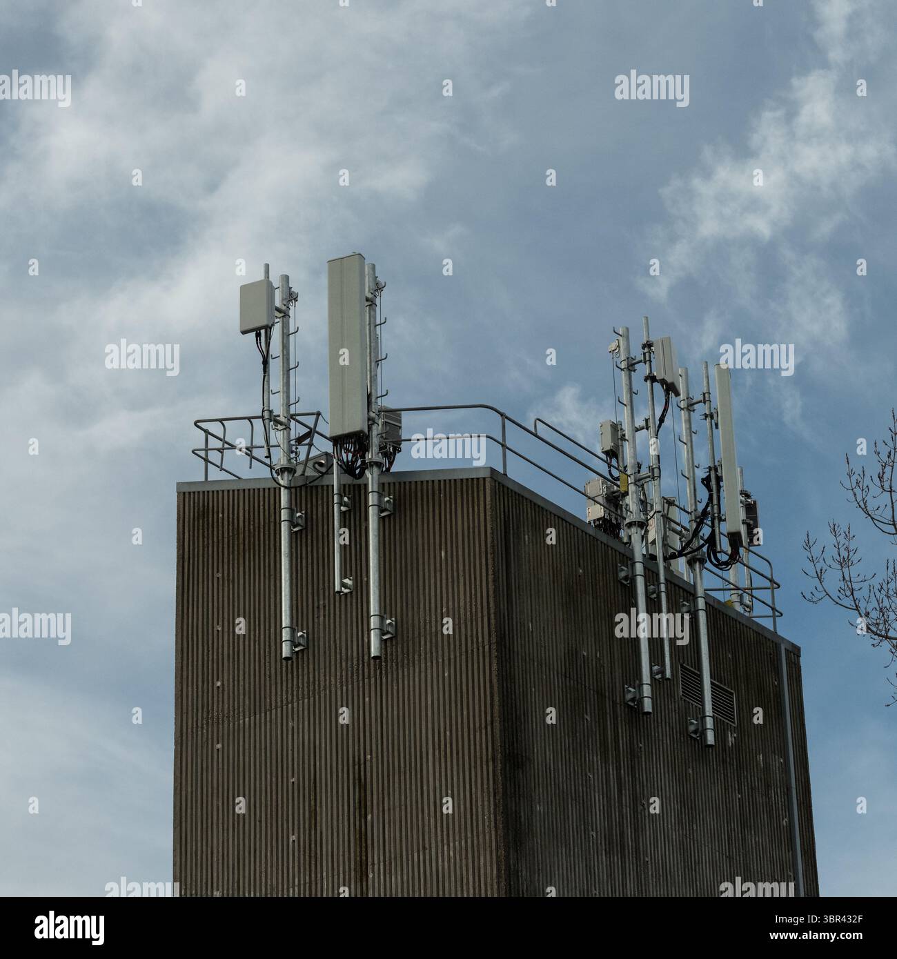 Mobile Phone and 4G 5G Internet Transmission Tower in city Stock Photo ...