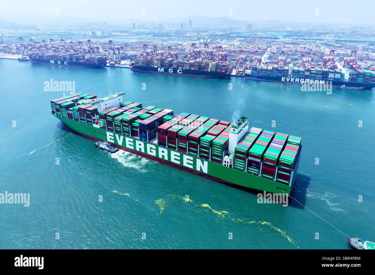 QINGDAO, CHINA - JULY 11, 2025 - A super cargo ship fully loaded with ...