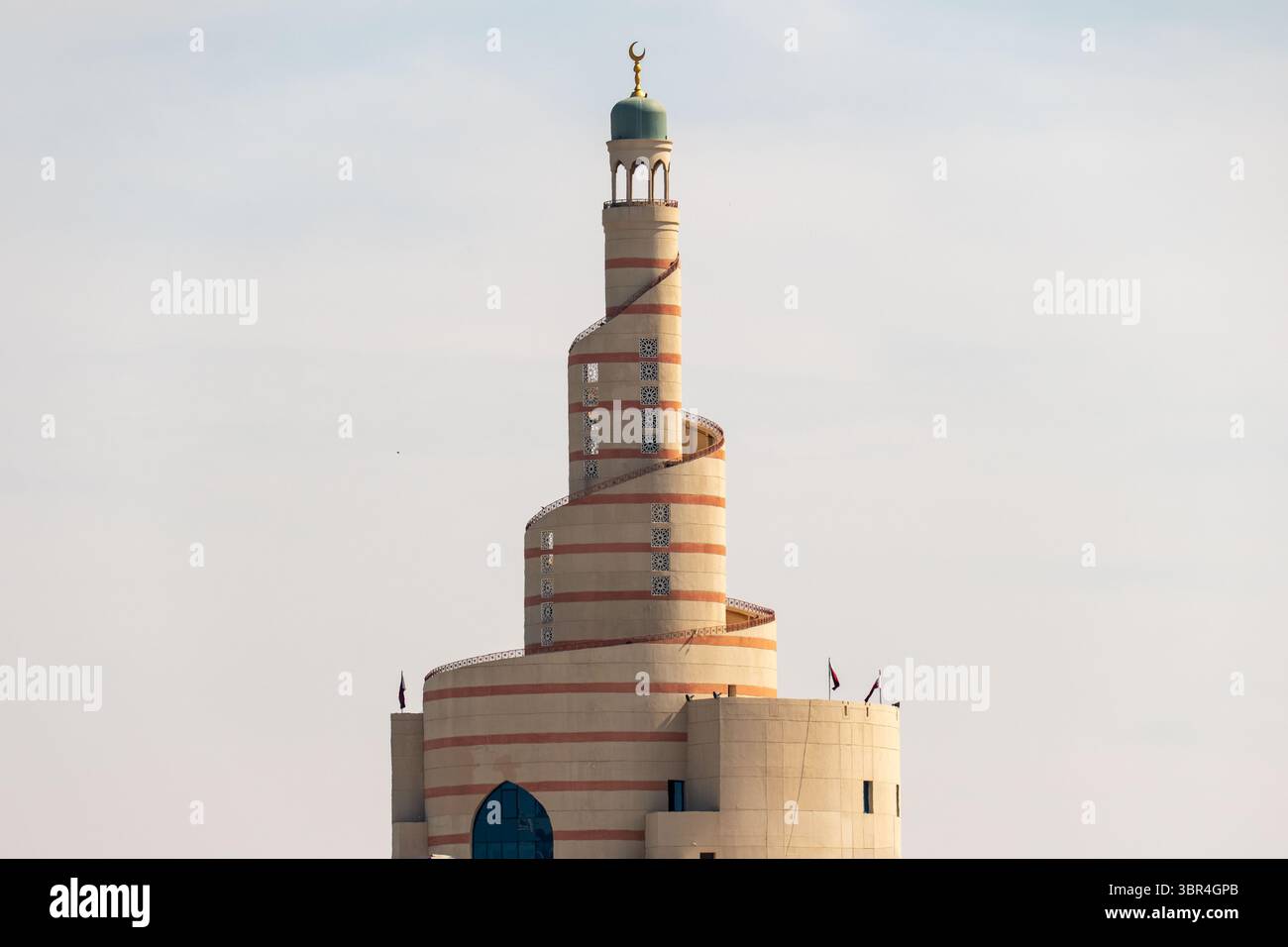 Islamic Cultural Center in Doha with blue sky. Also known as Al-Fanar ...