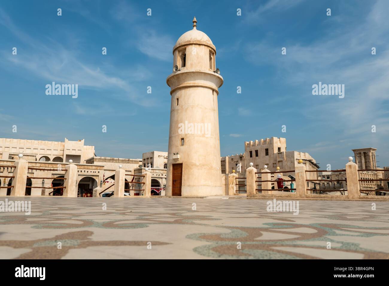 View of the minaret and open square at Souq Waqif in Doha, Qatar ...