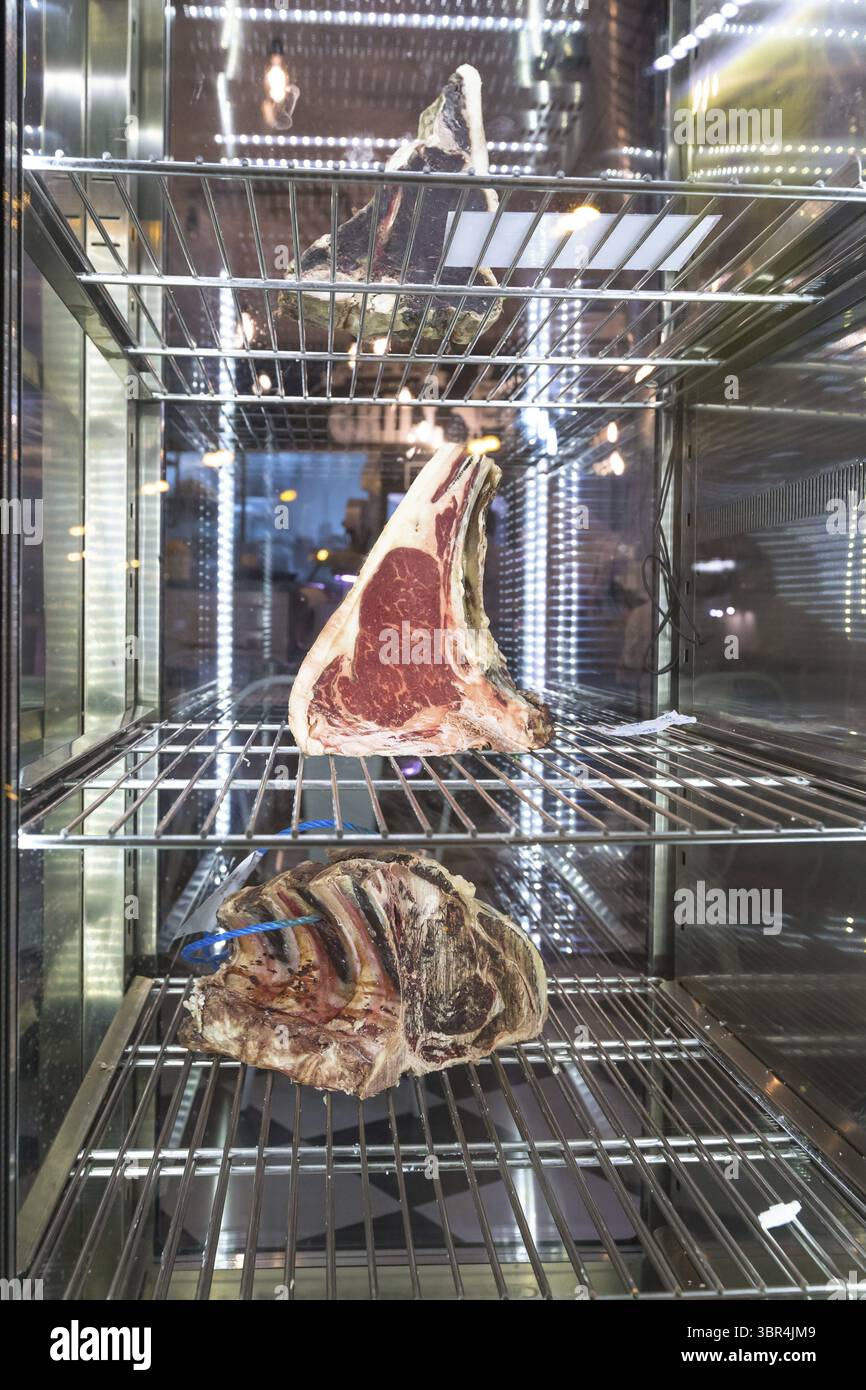 Display of Dry Aged Meat Steaks in butchers shop or restaurant in an ...