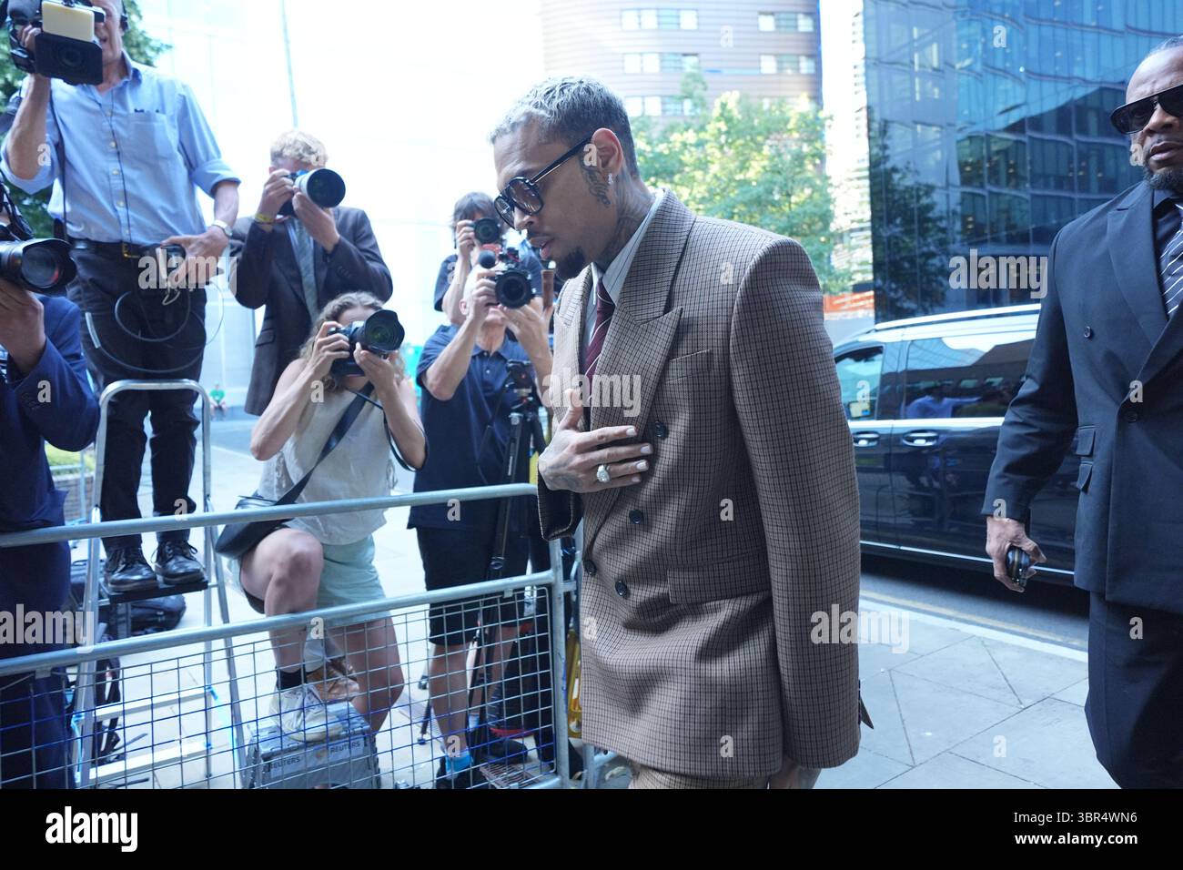 R&B singer Chris Brown arrives at Southwark Crown Court, south London ...