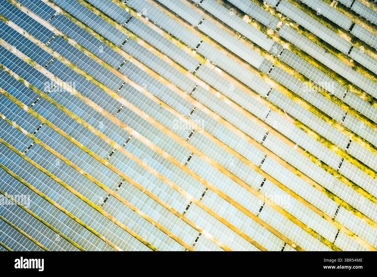 Aerial top down vertical modern solar panel array in caucasus ...