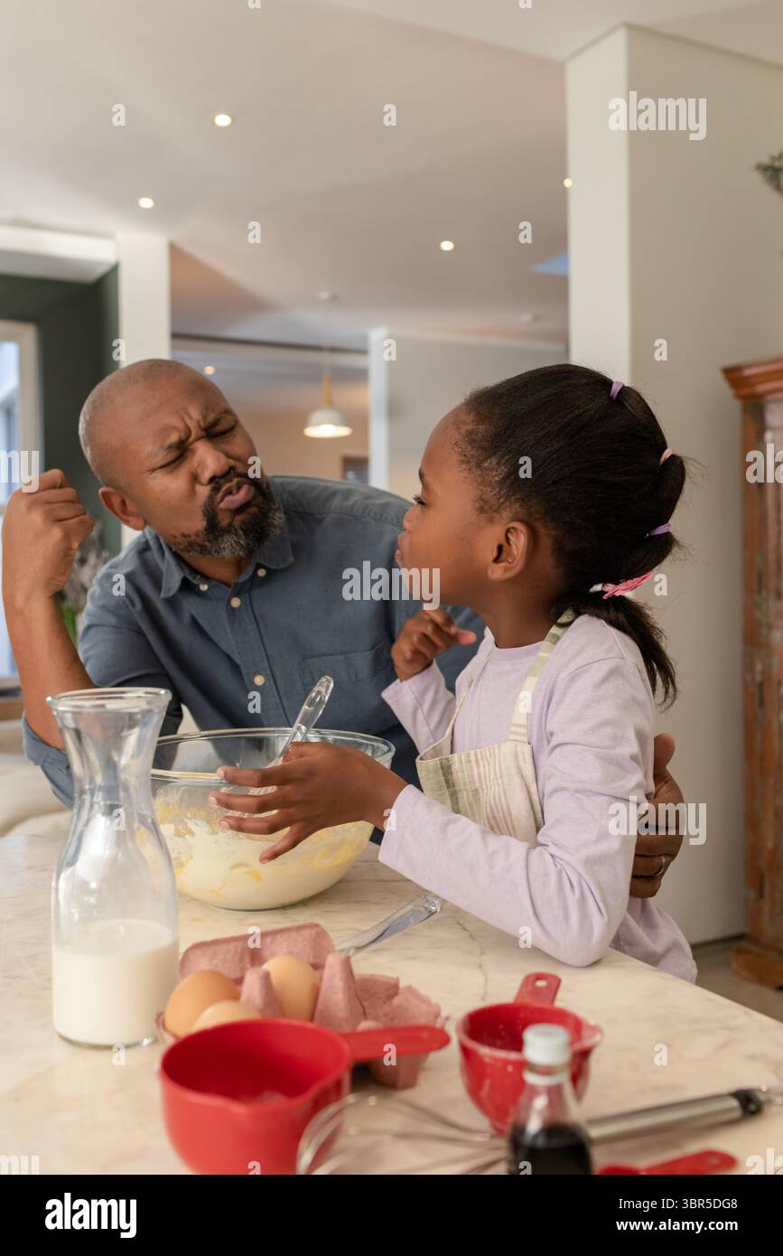 African american family stirring hi-res stock photography and images ...