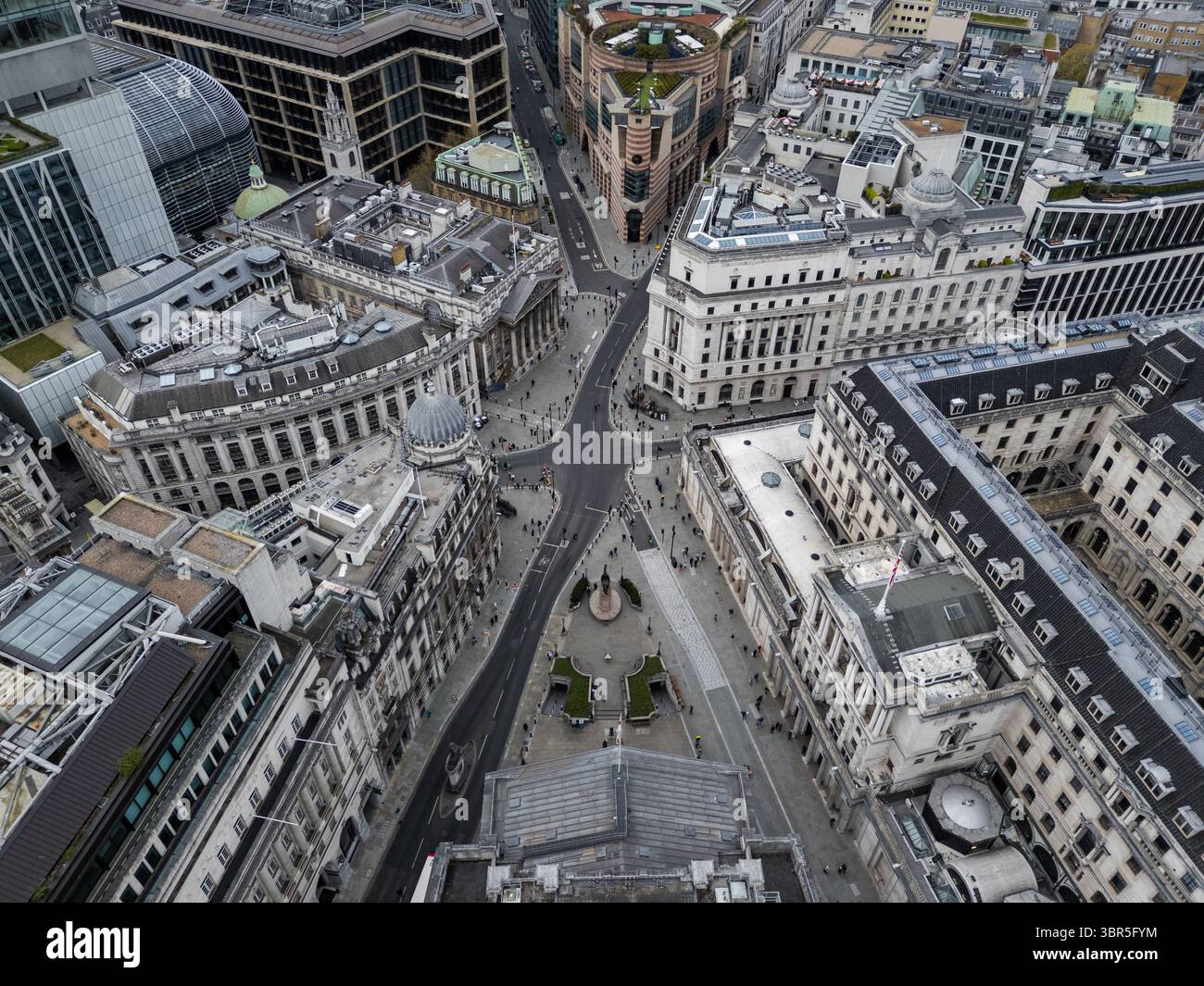 Aerial view of grand buildings flanking intricate streets, a tapestry ...