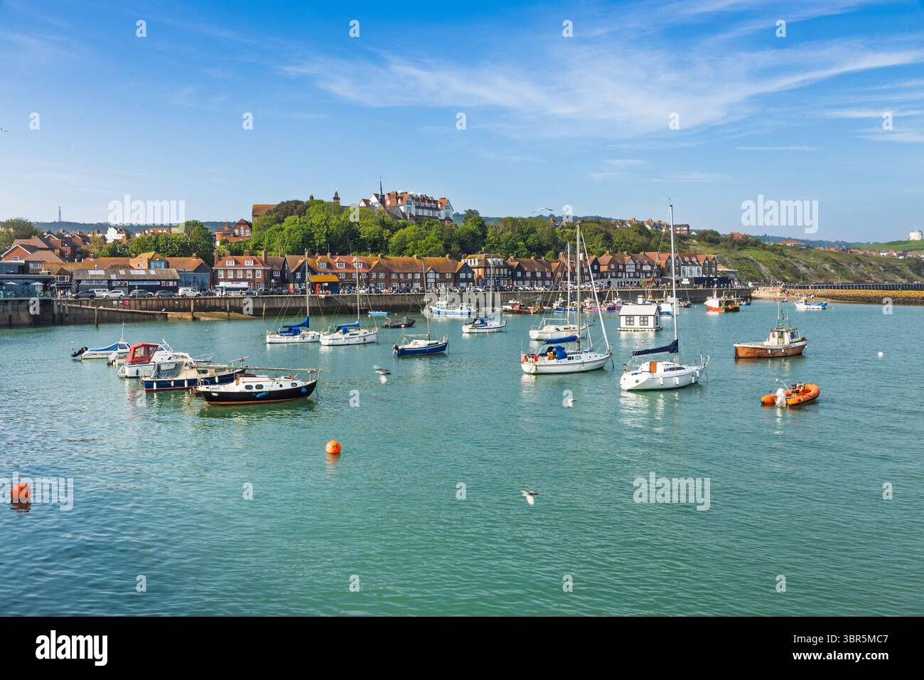 Fishing boats floating in Folkestone Harbour, Kent coast Stock Photo ...