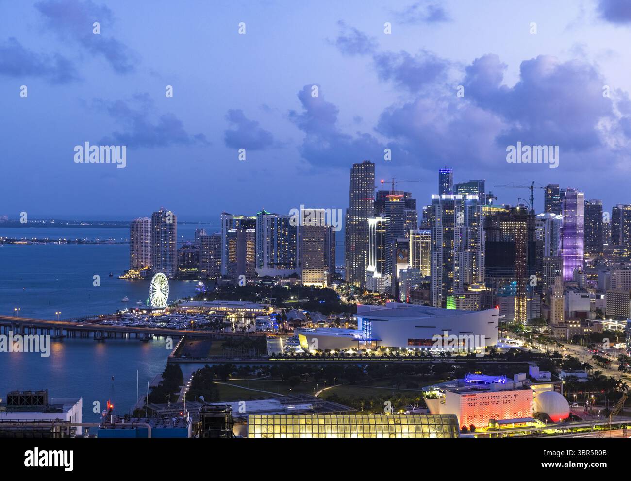 Aerial view of the vibrant, shimmering skyline reflecting on the ...