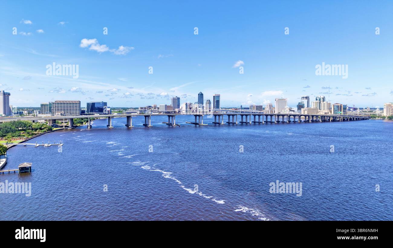 Aerial view of the expansive St. Johns River reflecting the clear blue ...