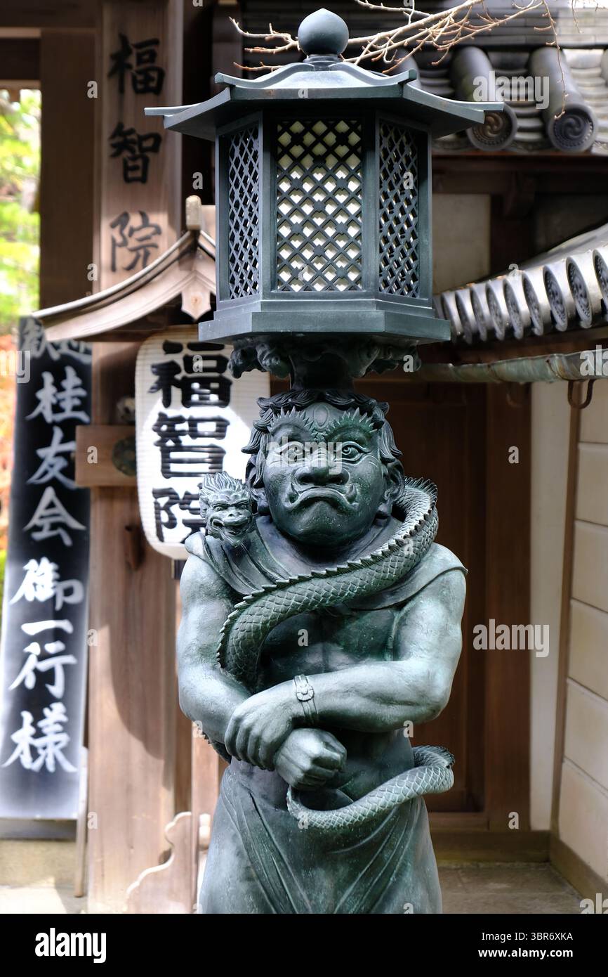 Statue in Japanese temple Stock Photo - Alamy
