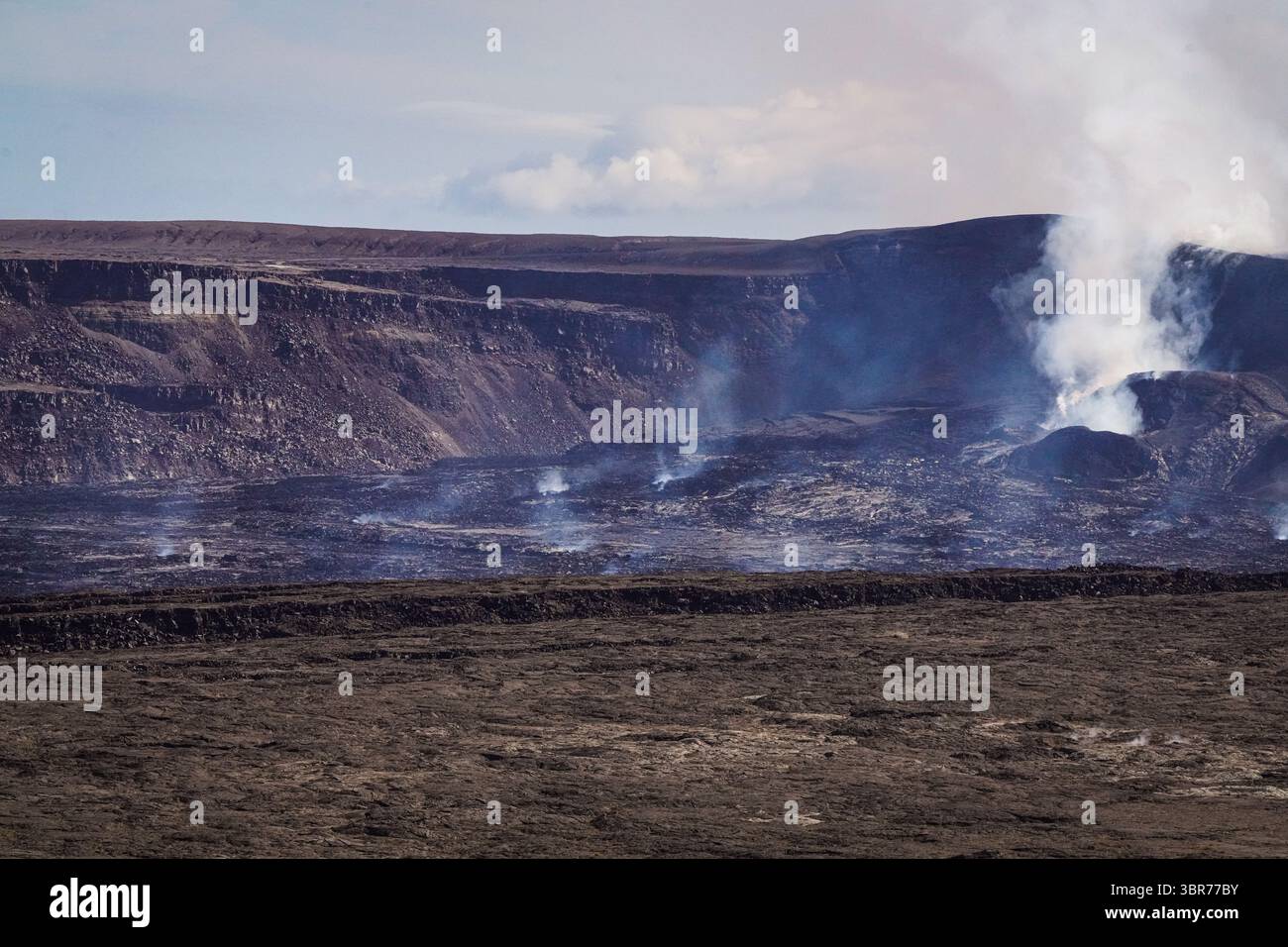 Nature’s Fury Awakens: Smoke Rises from Volcano Stock Photo - Alamy
