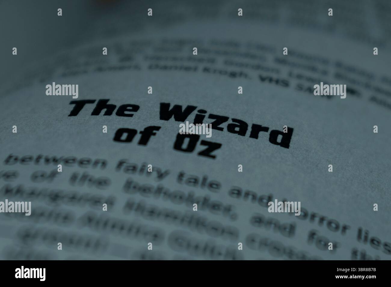 Close-up of book page showing "THE WIZARD OF OZ", 1939 movie directed ...