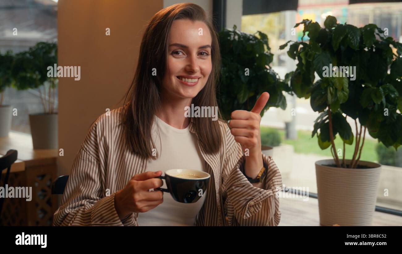 Caucasian woman drinking tasty good coffee in cafe girl female ...