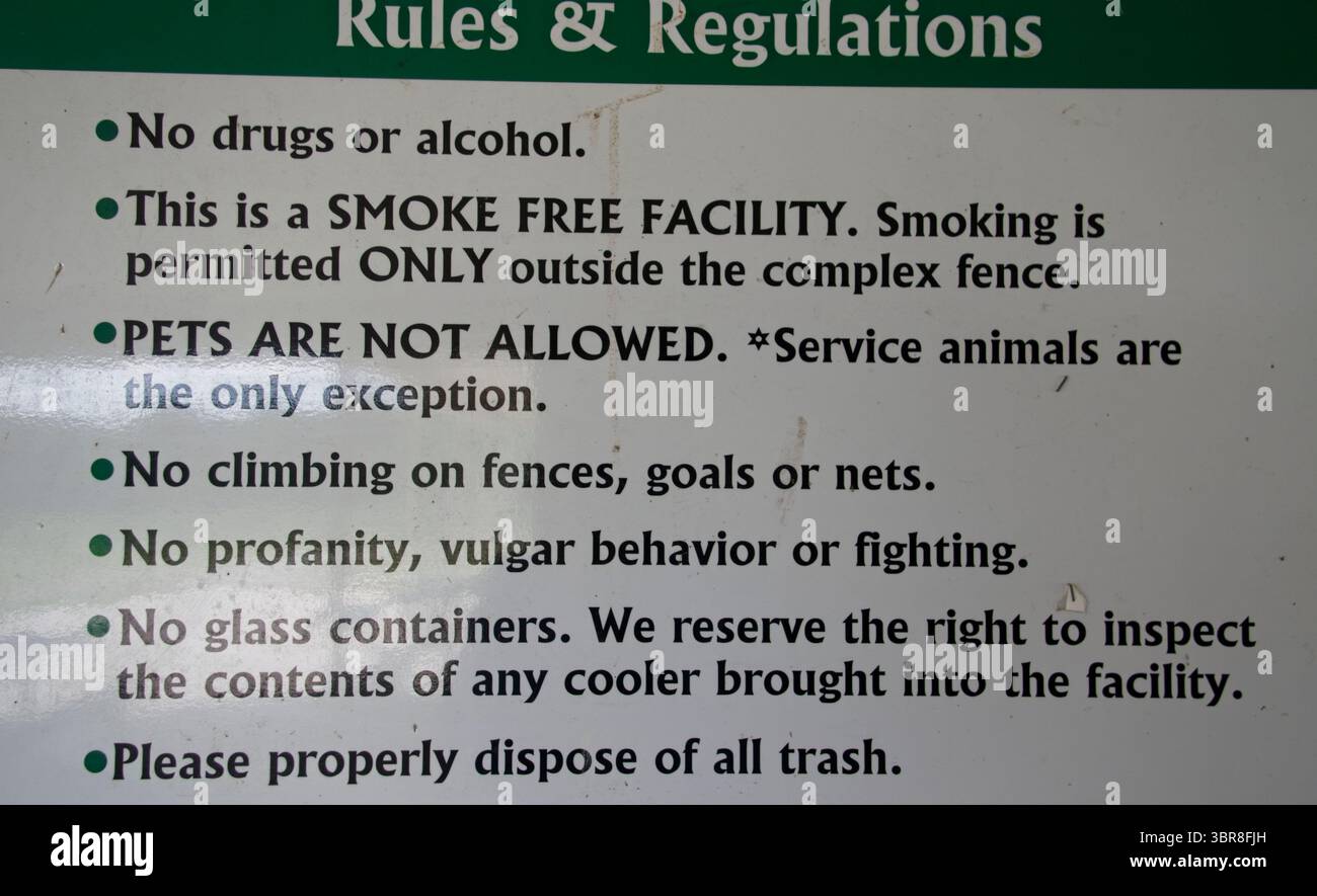 Sign with list of rules for public park Stock Photo - Alamy