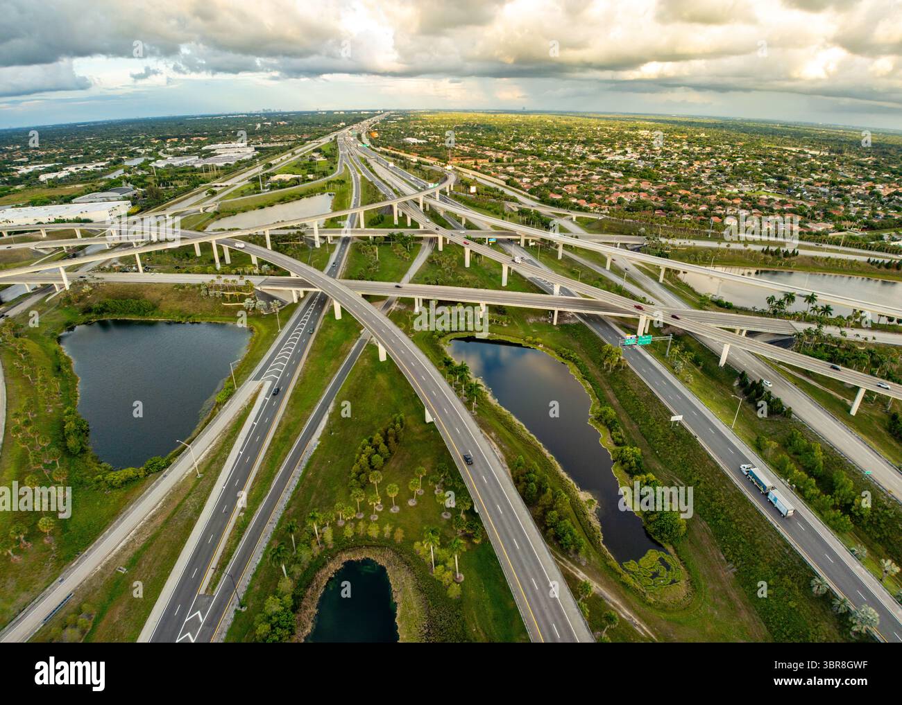 Aerial view of a complex highway interchange system weaving through ...