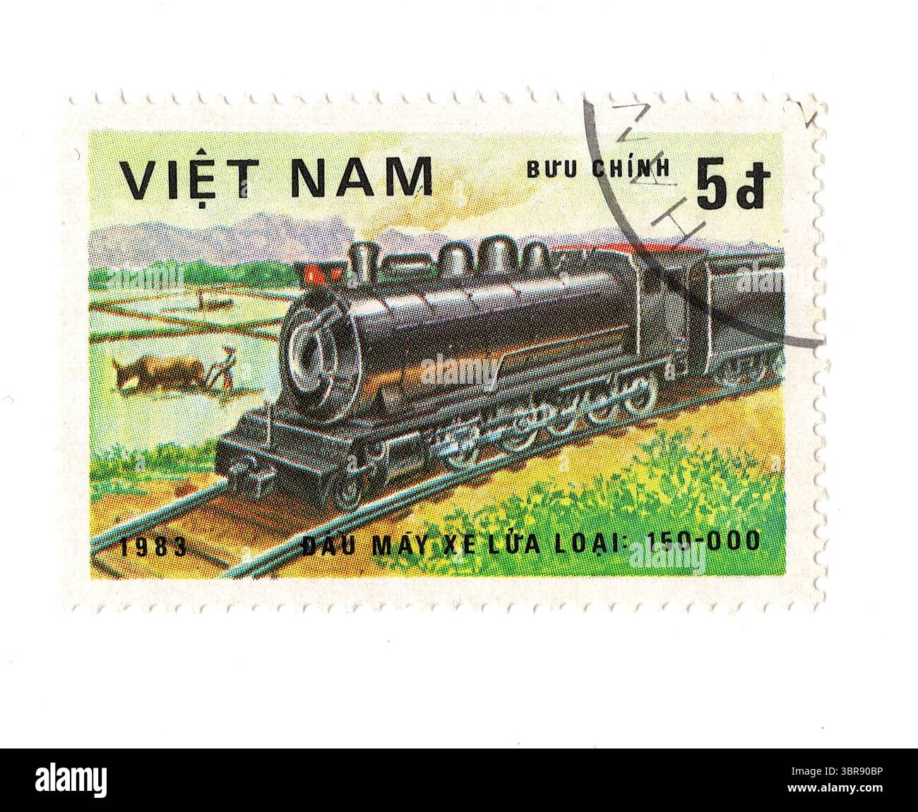 A vintage steam train postage stamp from Vietnam isolated on a white ...