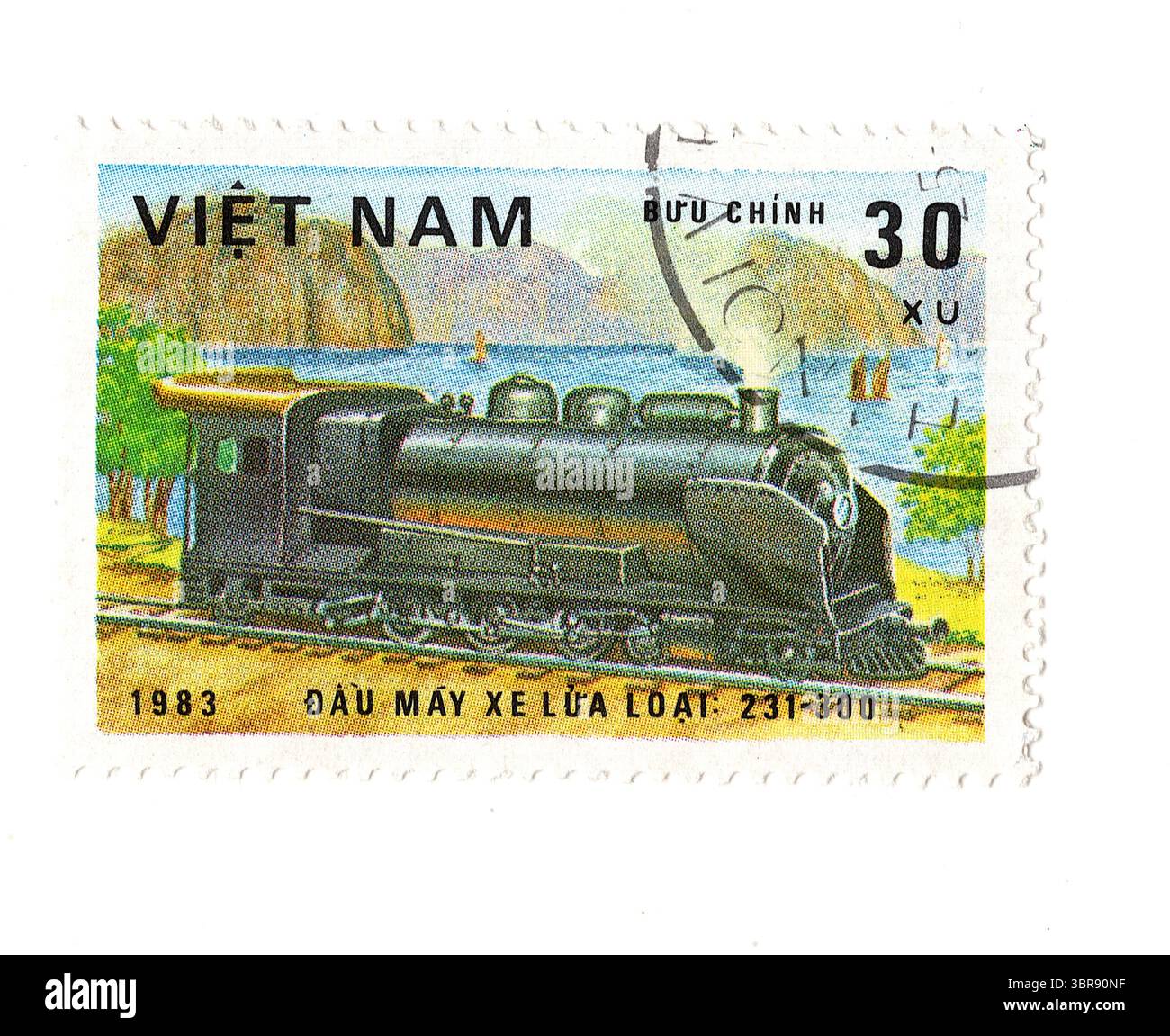 A vintage steam train postage stamp from Vietnam isolated on a white ...