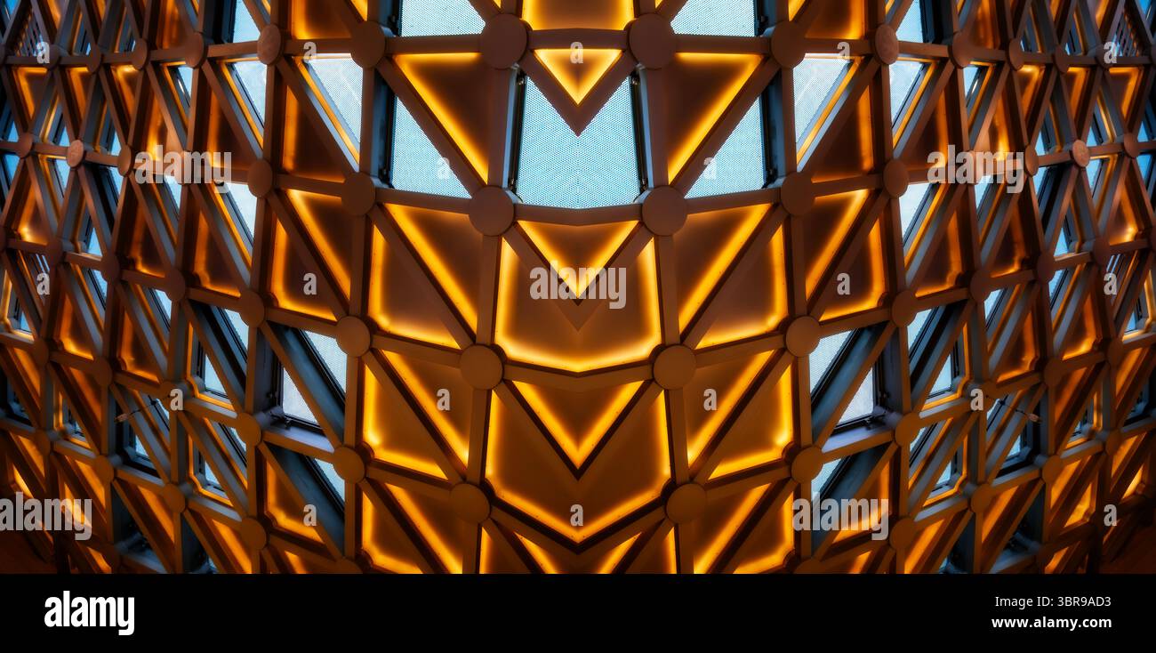 Architectural glass structure with a geometric triangular pattern ...