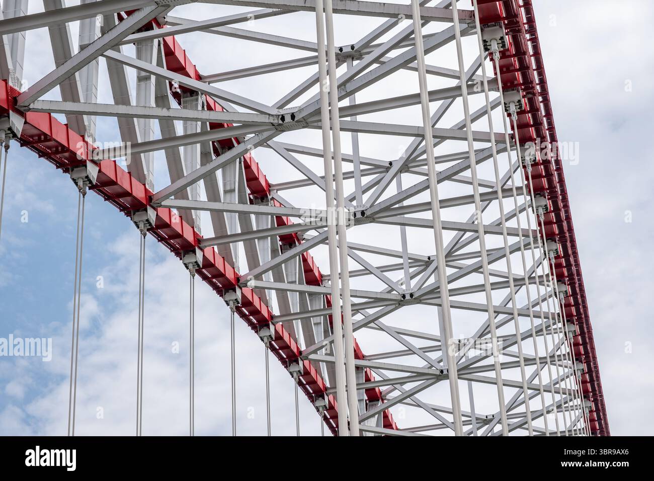 steel beams is bolted down. Close-up shows the connection of the metal ...