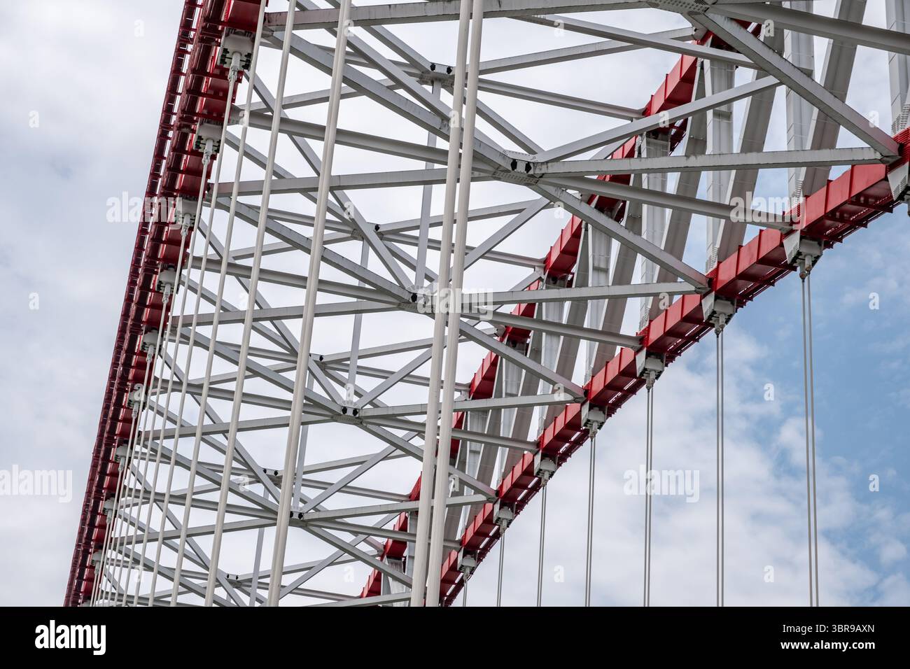 steel beams is bolted down. Close-up shows the connection of the metal ...