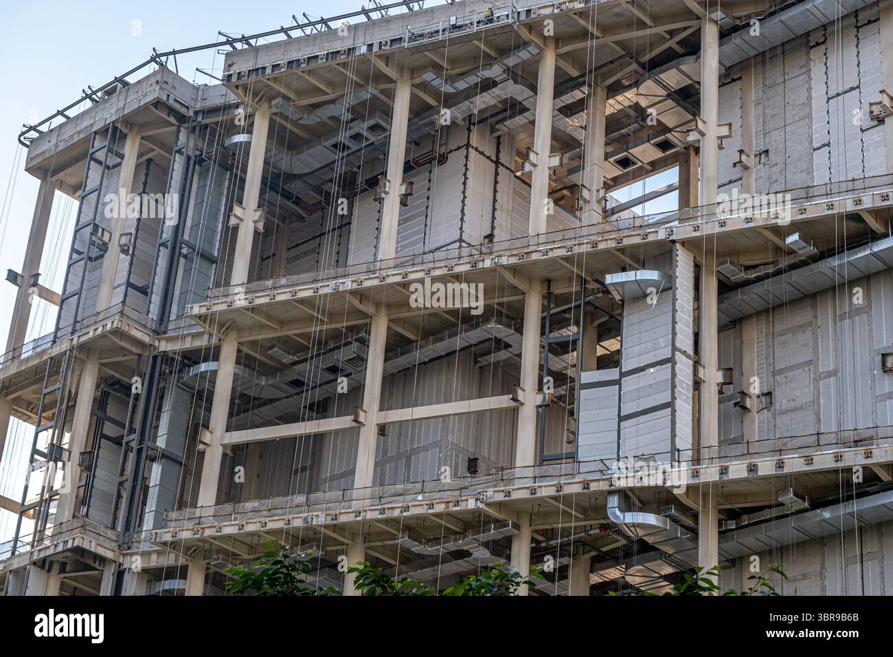 metal and concrete structure of a High-rise building under construction ...