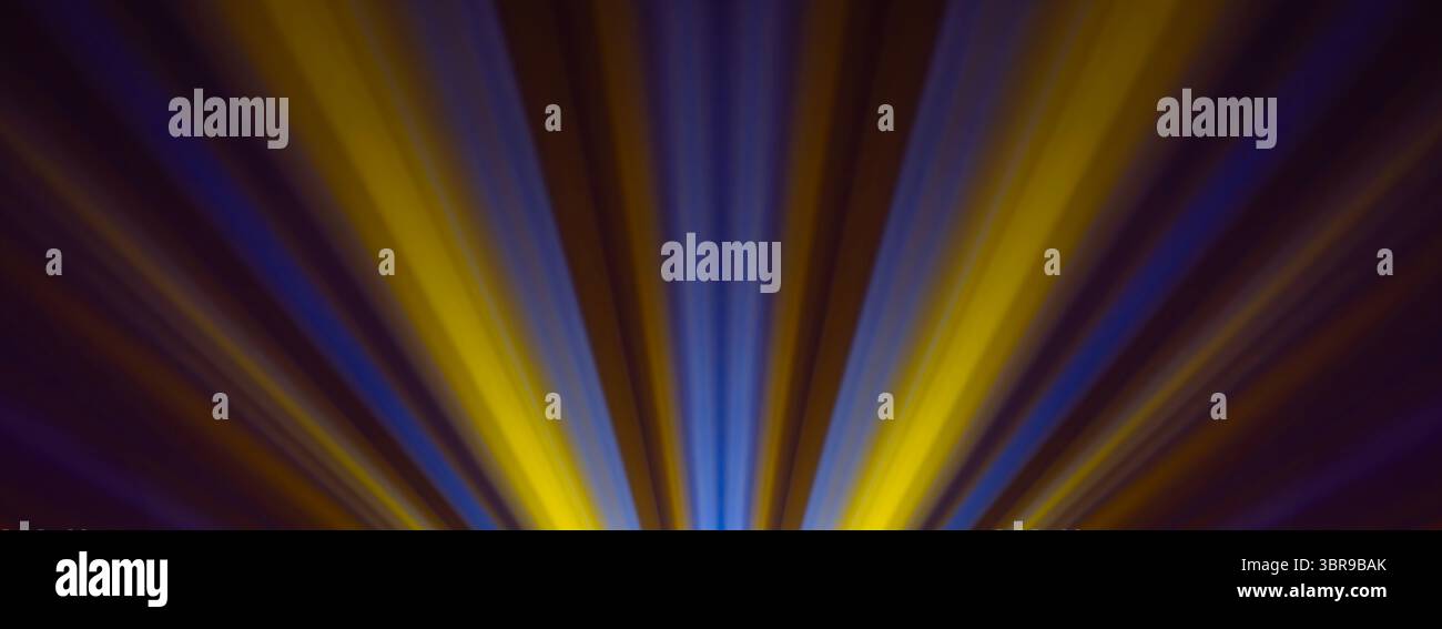 radial light beams in shades of yellow, blue, and purple emanating from ...