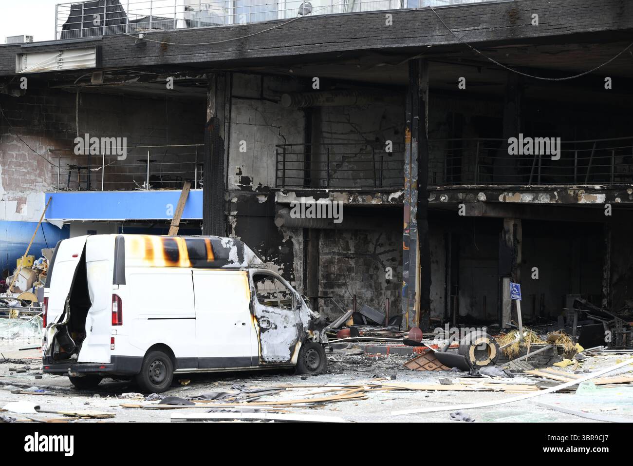 A destroyed store front pictured on the scene of an explosion in the ...