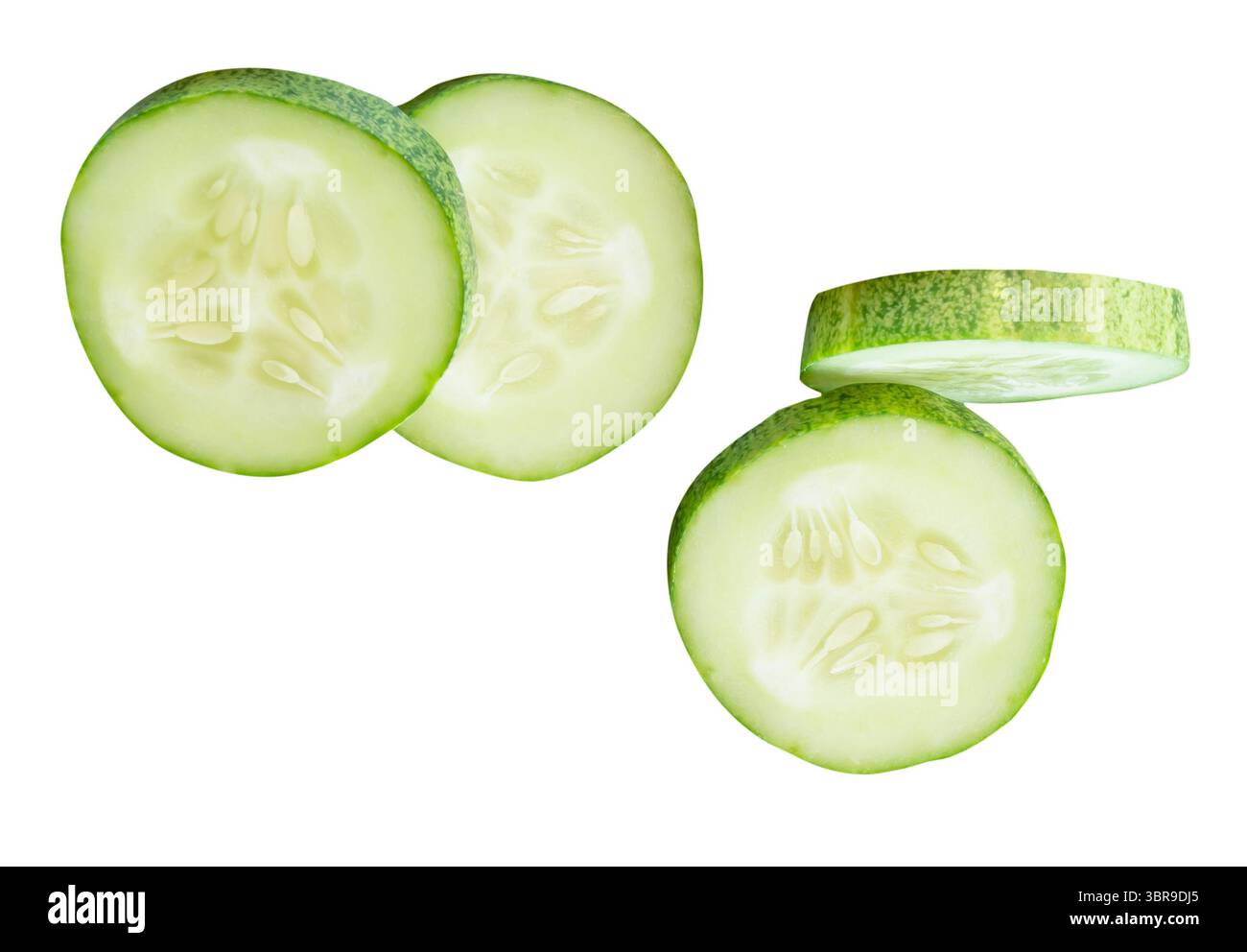 Top view set of fresh green cucumber slices in circle shape in stack is ...