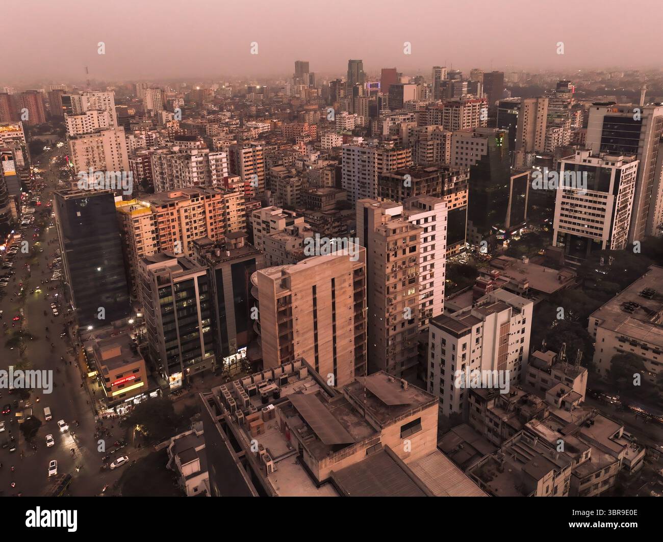 Aerial view of the dense urban landscape with a mix of high-rise buildings and lower structures ...
