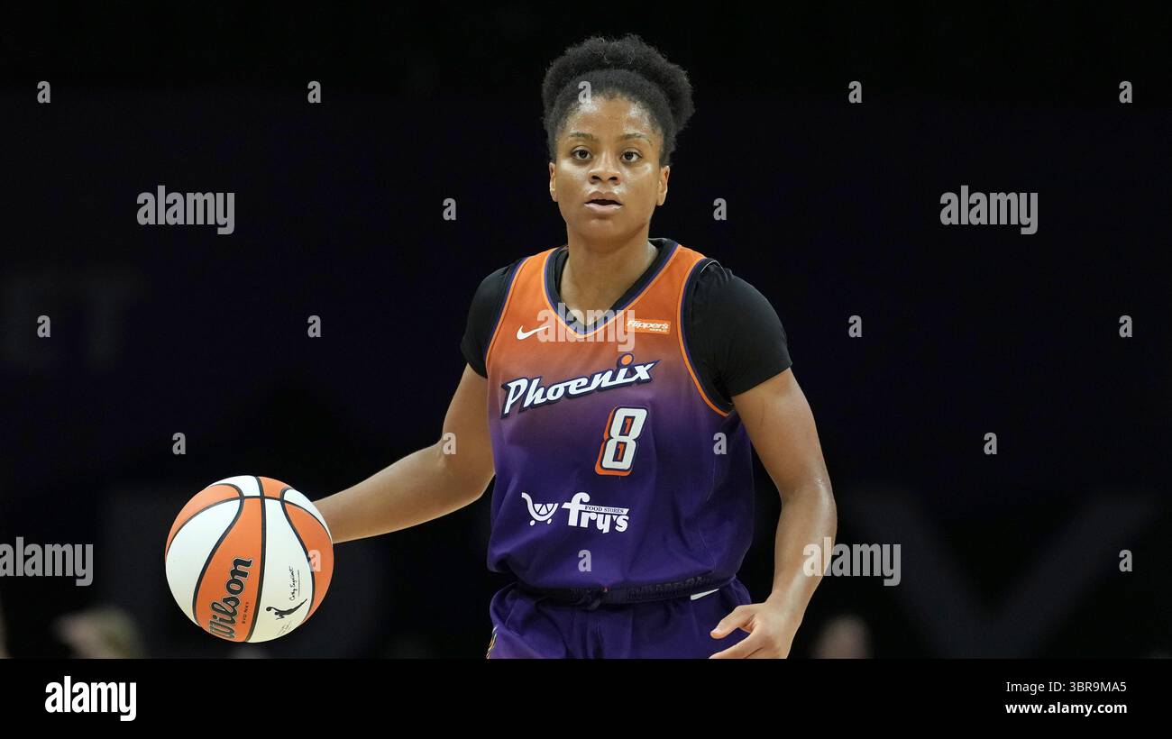 Phoenix Mercury guard Monique Akoa Makani dribbles the ball against the ...