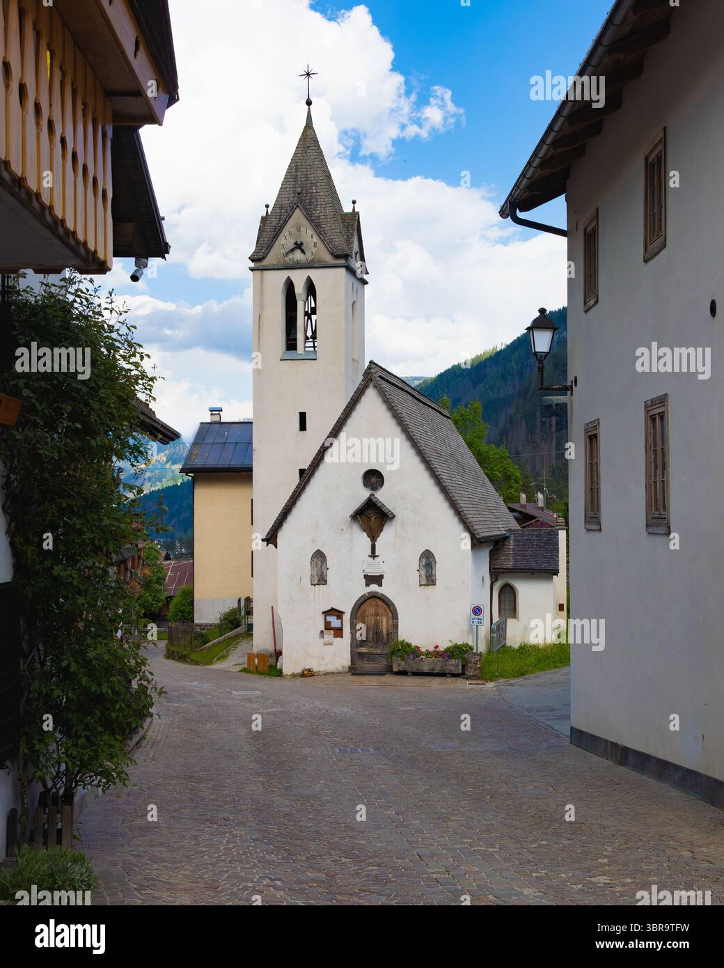 The charming San Rocco church in Sottoguda, a quaint Alpine village in ...